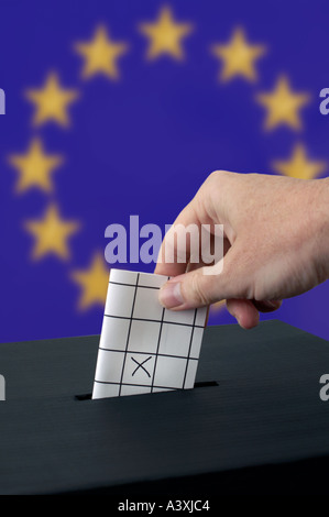 EU election, hand with european union flag, blue and yellow stars ...