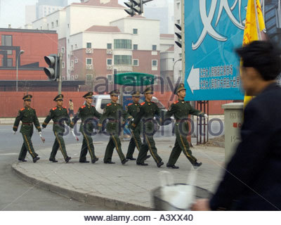 Chinese Traffic Police wearing uniform at the street standing and Stock ...