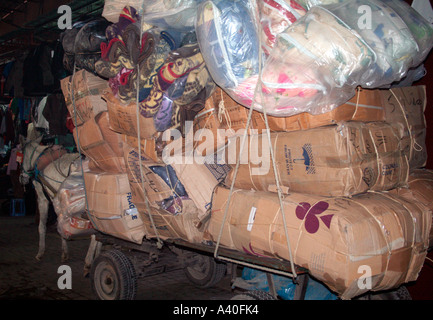 Overloaded donkey and cart in the souk, Marrakech, Morocco, Northwest ...