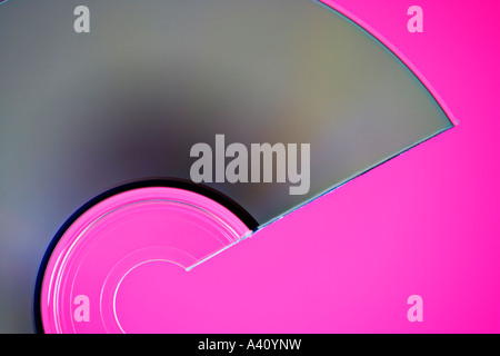 Compact disc with segment cut out Stock Photo - Alamy