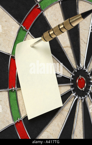 dart pin hit the bullseye on the dart Stock Photo - Alamy