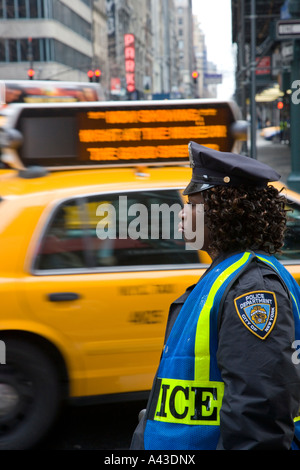 Side profile of NYPD police officer with peaked cap in Manhattan, New ...