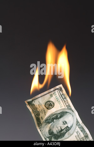Burning one hundred dollar bill. Washington. World Map. US financial ...