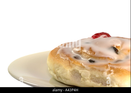 Belgian pastry bun icing and cherry Stock Photo - Alamy