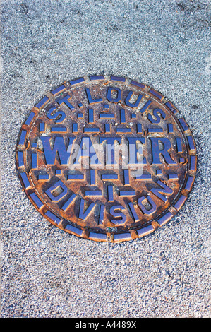 St Louis Water Division manhole cover showing a layer of silt deposited ...