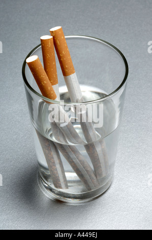 Cigarettes in water Stock Photo - Alamy