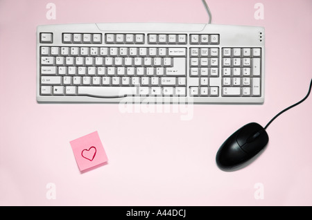 Computer keyboard, computer mouse and heart note Stock Photo - Alamy