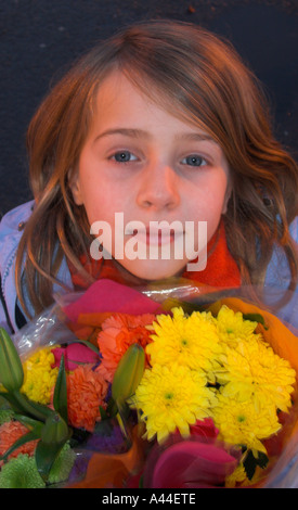young girl smiling cheekily Stock Photo - Alamy