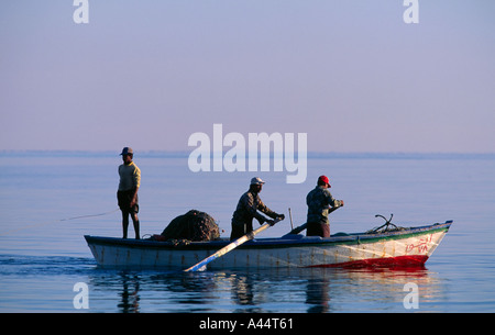 Traditional arab fishing boat rowing on a calm Red Sea with the Sinai ...