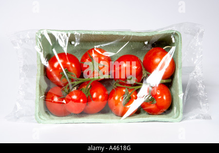Packed tomatoes on white background Stock Photo - Alamy