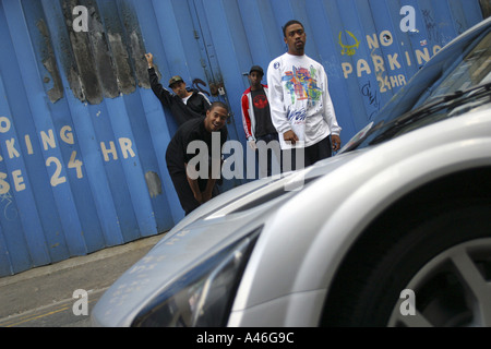 DJ Wylie and grime band Roll Deep Crew on the street in Hackney East ...