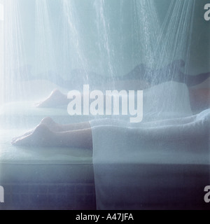 Luxury shower man showering in hotel bathroom washing off shoap from ...