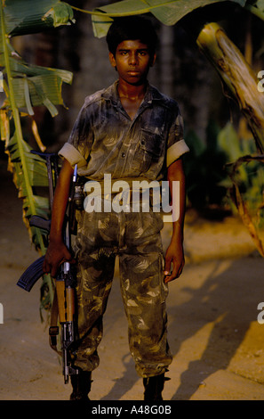 8 year old tamil tiger child soldier in Tamil headquarters Jaffna Peninsula Stock Photo - Alamy