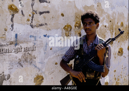 Young girl tamil tiger soldier on guard duty in Jaffna Sri Lanka Stock Photo - Alamy