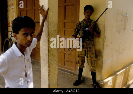 8 year old tamil tiger child soldier in Tamil headquarters Jaffna Peninsula Stock Photo - Alamy
