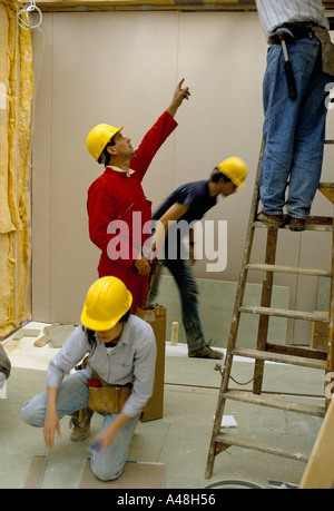 jehovah s witnesses in safety helmets building the new kingdom hall in ...