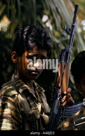 Young girl tamil tiger soldier on guard duty in Jaffna Sri Lanka Stock Photo - Alamy