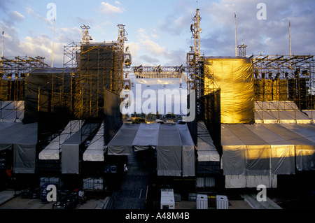Roadies or riggers building up the stage set for a concert by Irish ...