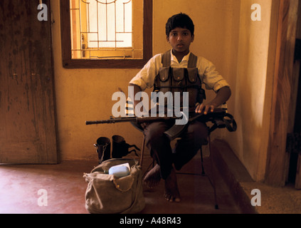 8 year old tamil tiger child soldier in Tamil headquarters Jaffna Peninsula Stock Photo - Alamy