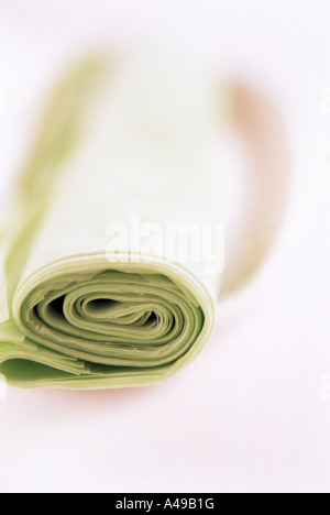 Rolled white paper sheets as background, closeup Stock Photo - Alamy