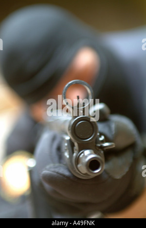 Member of a SWAT Team aiming with his gun Stock Photo: 10978161 - Alamy