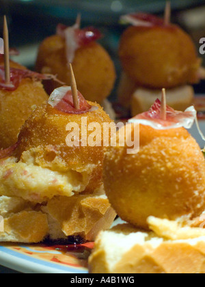Traditional tapas and pinchos on a counter in a bar in Spain Stock ...