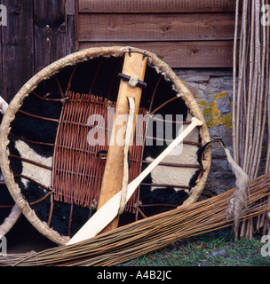 A round coracle, a traditional boat made of willow withies covered with ...
