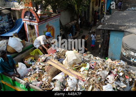 Stock image of garbage collection in Chennai slum Tamil Nadu India ...