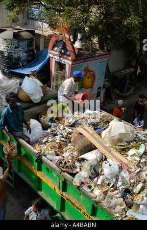 Stock image of garbage collection in Chennai slum Tamil Nadu India ...