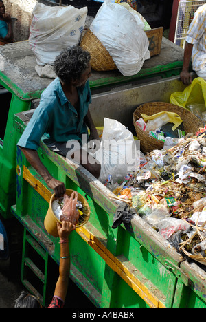 Stock image of garbage collection in Chennai slum Tamil Nadu India ...