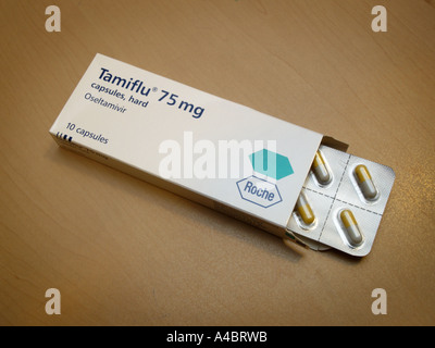 Tamiflu medicine box with blister and capsules closeup with lots of ...