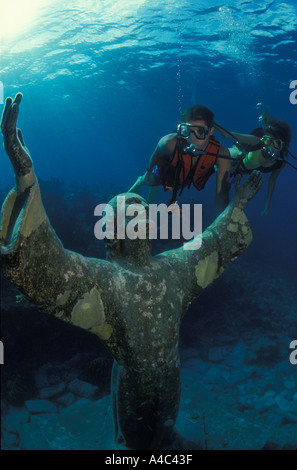 SCUBA DIVER AND STATUE OF CHRIST OF THE ABYSS FLORIDA KEYS NATIONAL ...