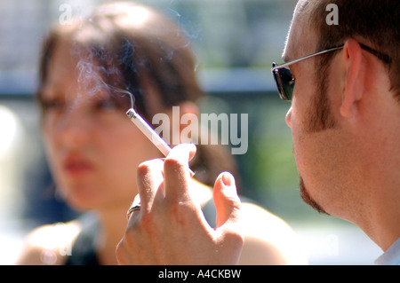 university students smoking cigarettes in campus, Bavaria, Germany ...