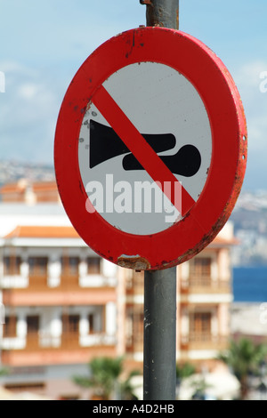 No honking hooting traffic road sign, horns forbidden sign, no noise ...