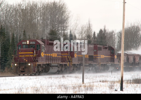 Train hauling taconite through iron range in northern Minnesota Stock ...