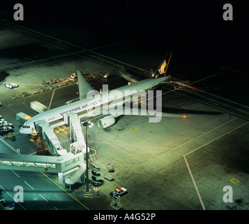 Apron control tower from the window of a passenger jet, Heathrow ...