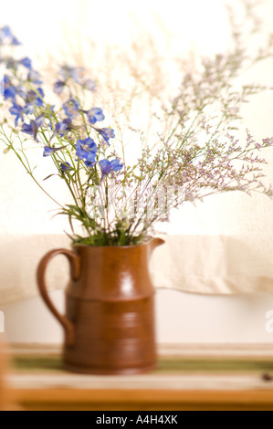 A vertical selective focus of wildflowers in a meadow Stock Photo - Alamy