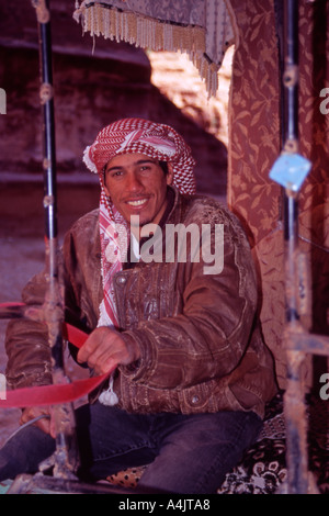 A portrait of two young Jordanian Arab boys posing with a soccer ball ...