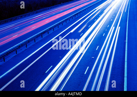 Speed blue light trails with motion blur of night lights Stock Photo ...