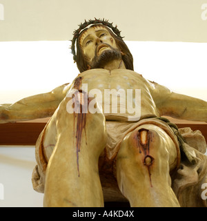 Jesus on the cross the crucifixion torso and leg detail Stock Photo ...