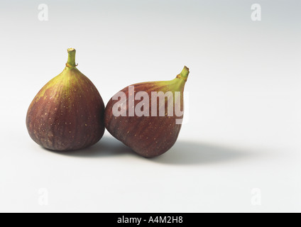 Two ripe organic figs, close-up, isolated on white Stock Photo - Alamy