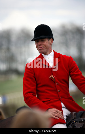 Huntsman in red, point to point Stock Photo - Alamy