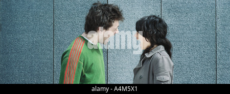 Two young men screaming each other Stock Photo - Alamy