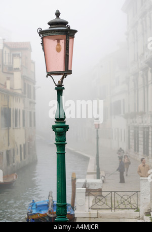 Lamppost and misty canal in morning. Canneregio, Venice, Italy Stock ...