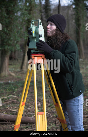 Female civil engineering surveyor with theodolite Stock Photo - Alamy