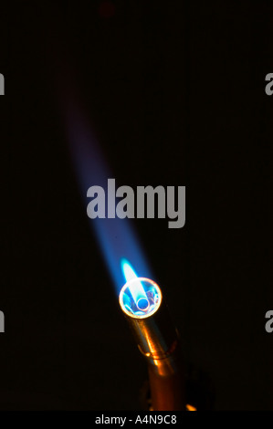 Propane blow torch with blue flame Stock Photo - Alamy