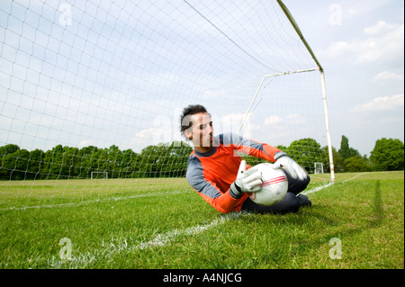 Soccer football goalie keeper saving goal Stock Photo: 102933304 - Alamy