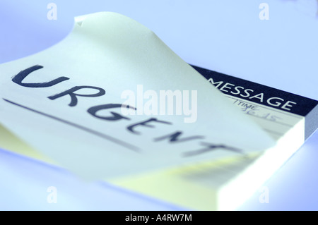 urgent stick message Stock Photo - Alamy