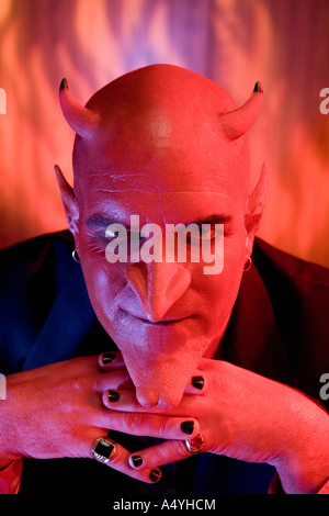 Man dressed as Satan the Devil Stock Photo - Alamy