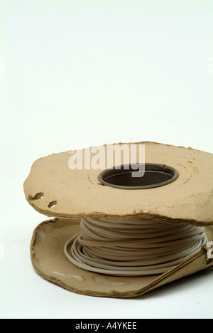 old telephone cable reel on white background Stock Photo - Alamy